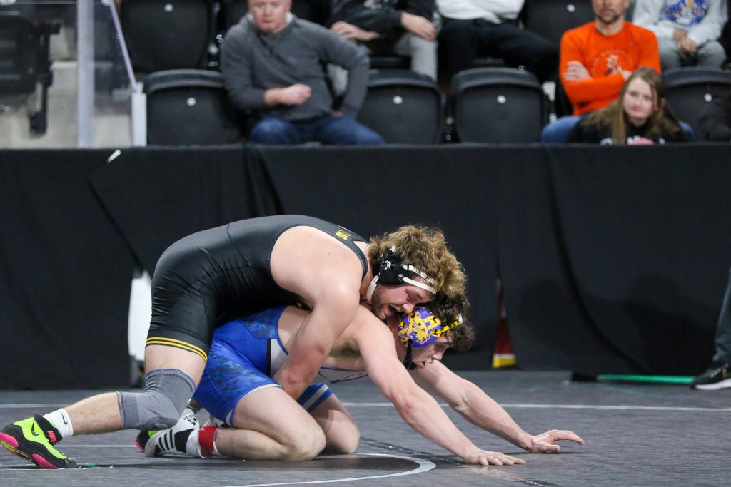 Iowa wrestling hires former Hawkeye five-time All-American Jacob Warner ...