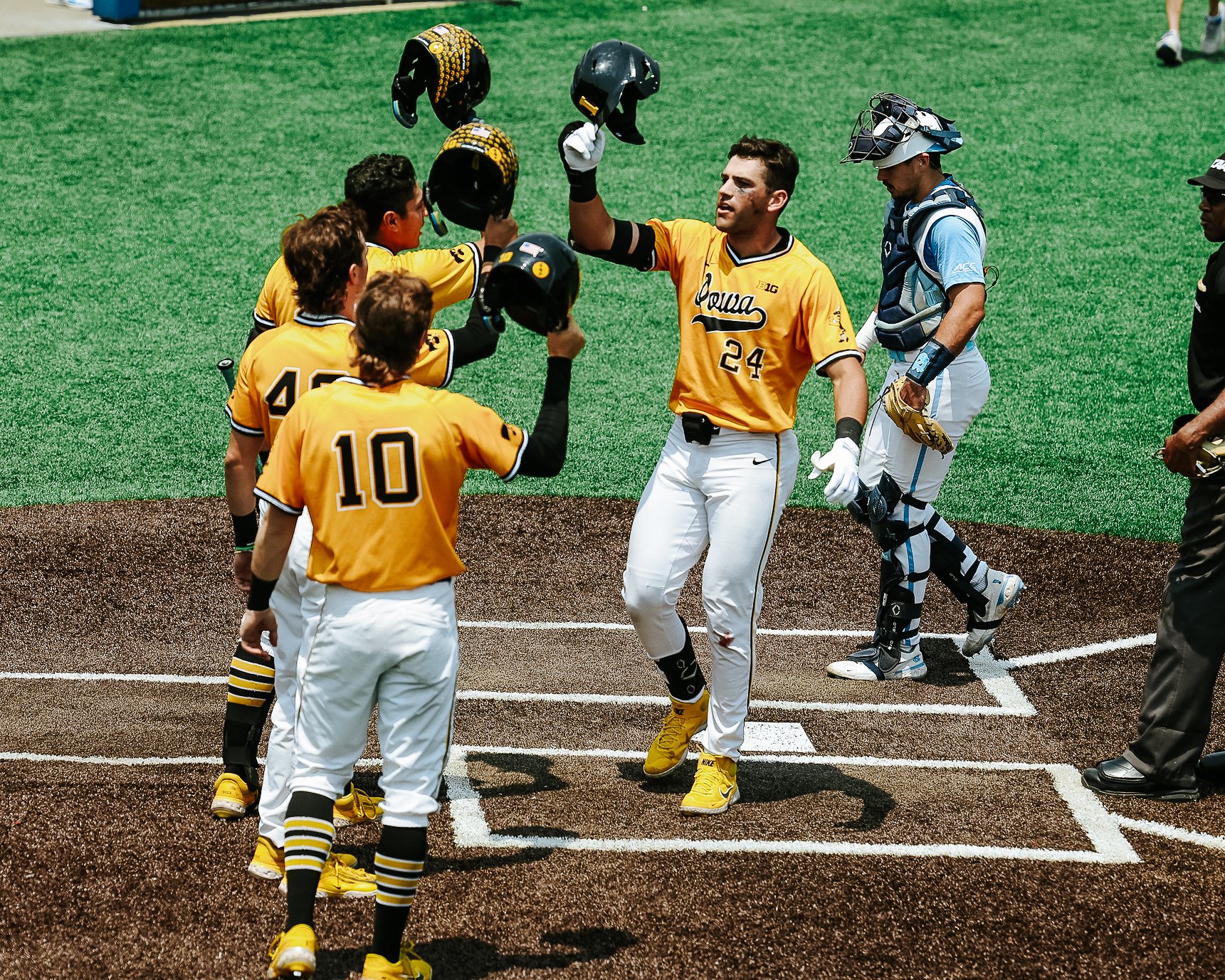 Iowa defeats North Carolina 6-5 in 13 innings to avoid elimination ...