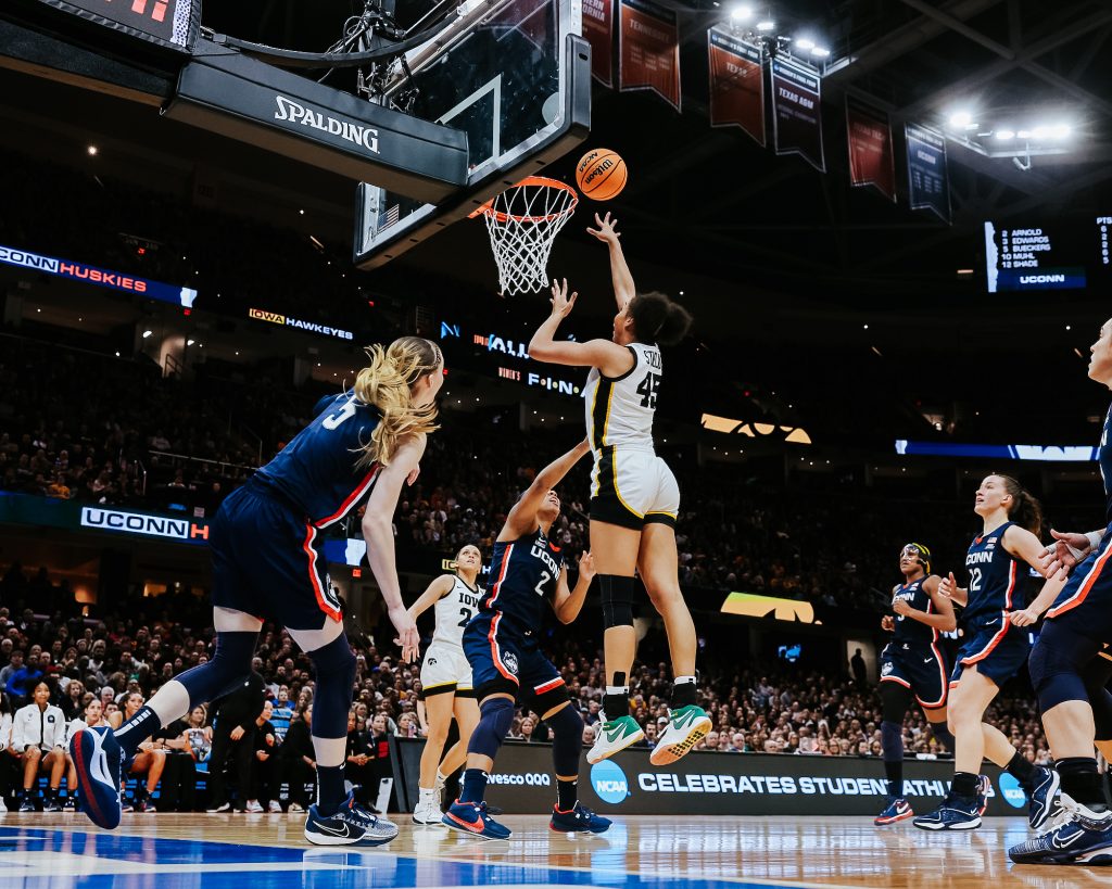 Defensive stand carries Iowa to second straight national title game ...
