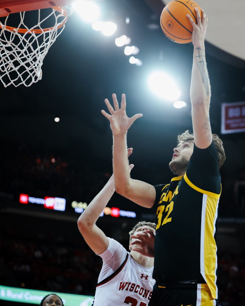 Wisconsin shreds Iowa's sieve-like defense in 116-85 beat-down in ...