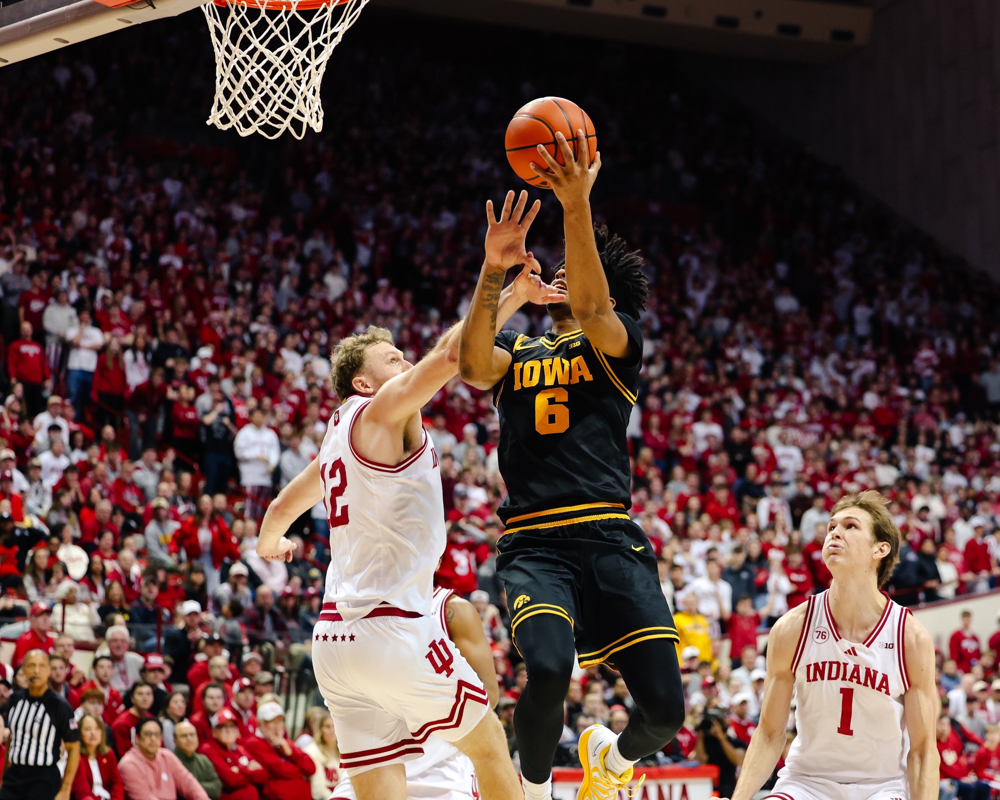 Iowa men's hoop prevails 74-57 in battle of former Drake head coaches ...